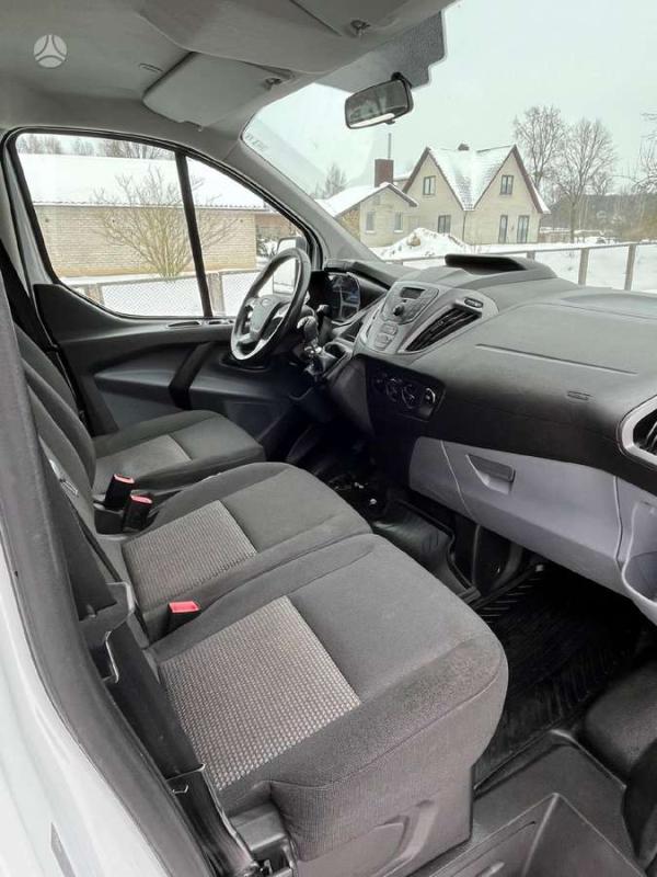 White Ford Transit Custom 2017 in Silale, with an engine capacity of 2.00 L and mileage of 159 thousand km for 10390 €, photo 11 on AUTOMOTO.COM.LV