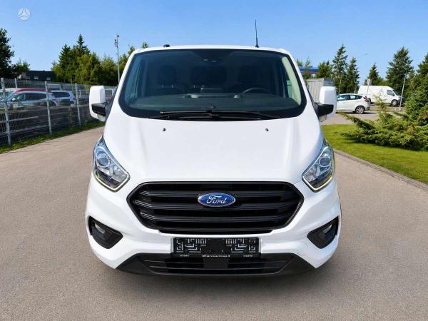 White Ford Transit Custom 2018 in Pakruojis, with an engine capacity of 2.00 L and mileage of 183 thousand km for 7400 €, photo 2 on AUTOMOTO.COM.LV