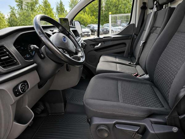White Ford Transit Custom 2018 in Pakruojis, with an engine capacity of 2.00 L and mileage of 183 thousand km for 7400 €, photo 7 on AUTOMOTO.COM.LV