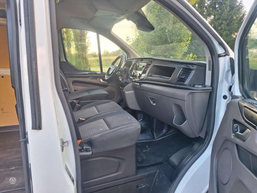 White Ford Transit Custom 2018 in Taurage, with an engine capacity of 2.00 L and mileage of 234 thousand km for 6400 €, photo 9 on AUTOMOTO.COM.LV