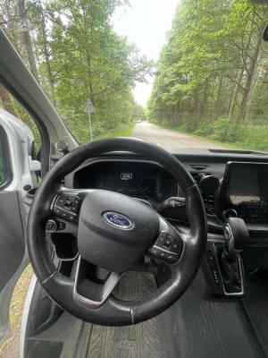 White Ford Transit Custom 2018 in Klaipeda, with an engine capacity of 2.00 L and mileage of 263 thousand km for 16000 €, photo 4 on AUTOMOTO.COM.LV