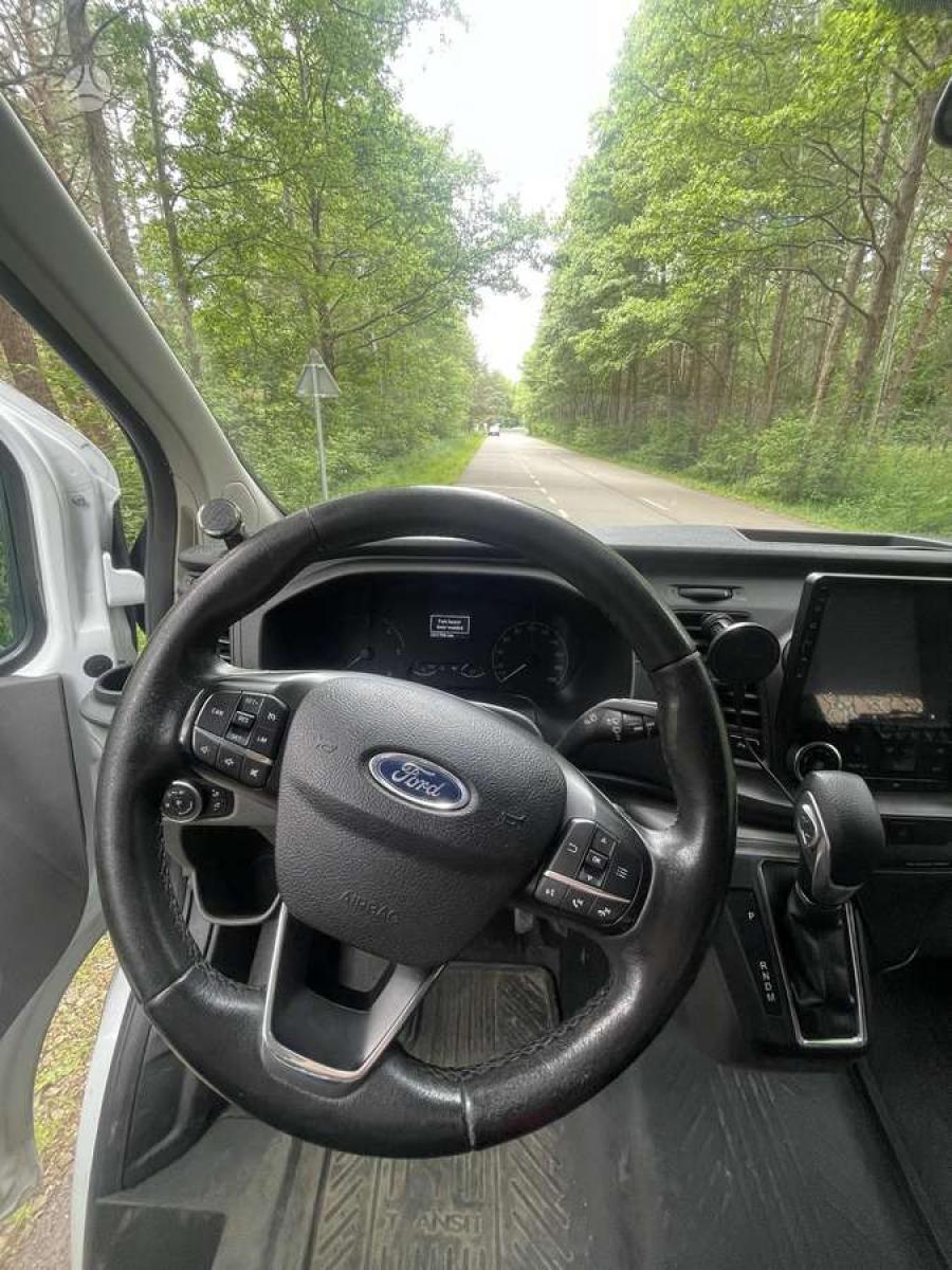 White Ford Transit Custom 2018 in Klaipeda, with an engine capacity of 2.00 L and mileage of 263 thousand km for 16000 €, photo 4 on AUTOMOTO.COM.LV