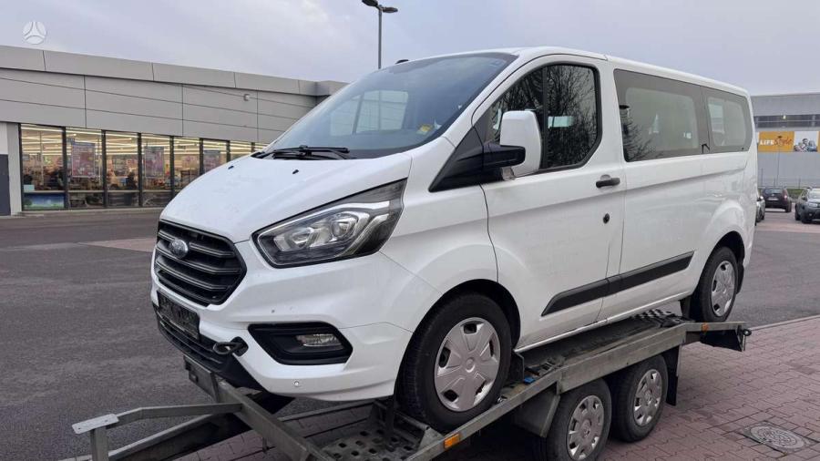 White Ford Transit Custom 2019 in Kelme, with an engine capacity of 2.00 L and mileage of 228 thousand km for 11300 €, photo 3 on AUTOMOTO.COM.LV