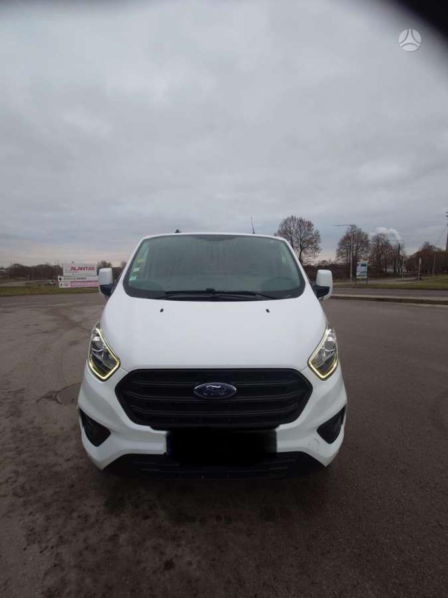 White Ford Transit Custom 2020 in Taurage, with an engine capacity of 2.00 L and mileage of 210 thousand km for 10648 €, photo 3 on AUTOMOTO.COM.LV