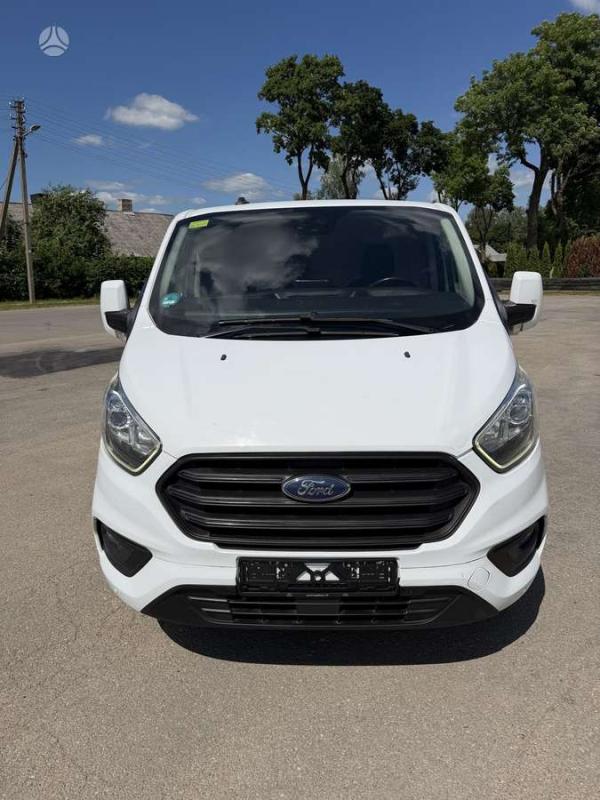 White Ford Transit Custom 2020 in Skaudvile, with an engine capacity of 2.00 L and mileage of 186 thousand km for 11900 €, photo 3 on AUTOMOTO.COM.LV