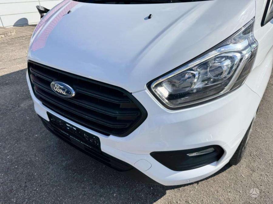 White Ford Transit Custom 2020 in Radviliskis, with an engine capacity of 2.00 L and mileage of 158 thousand km for 14459 €, photo 30 on AUTOMOTO.COM.LV
