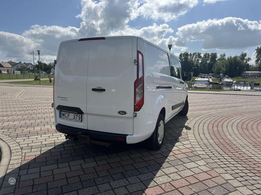 White Ford Transit Custom 2021 in Silute, with an engine capacity of 2.00 L and mileage of 153 thousand km for 14990 €, photo 4 on AUTOMOTO.COM.LV