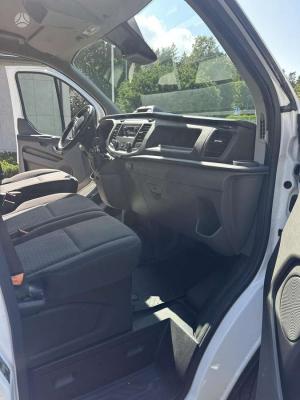 White Ford Transit Custom 2021 in Silute, with an engine capacity of 2.00 L and mileage of 153 thousand km for 14990 €, photo 10 on AUTOMOTO.COM.LV