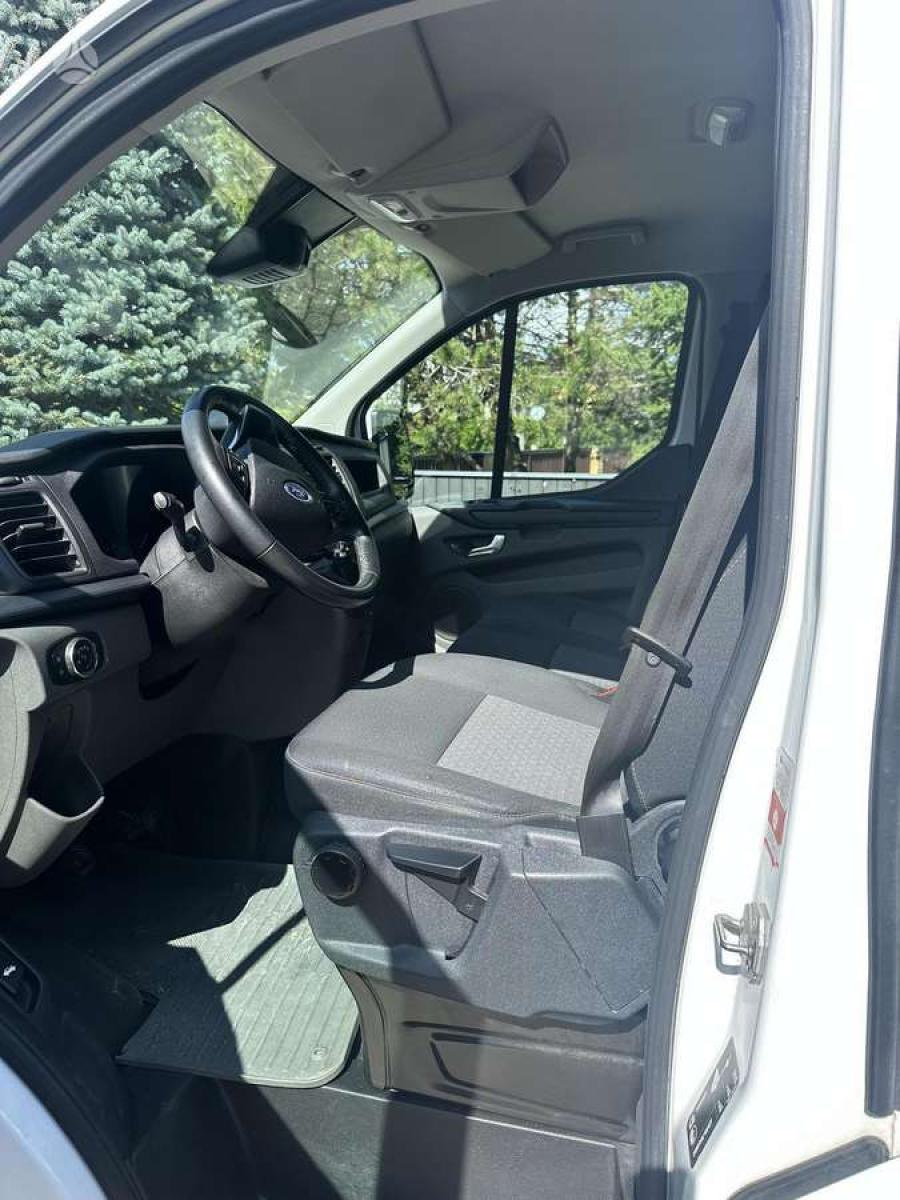 White Ford Transit Custom 2021 in Silute, with an engine capacity of 2.00 L and mileage of 153 thousand km for 14990 €, photo 11 on AUTOMOTO.COM.LV