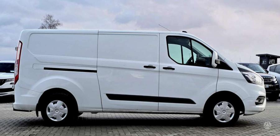 White Ford Transit Custom 2023 in Taurage, with an engine capacity of 2.00 L and mileage of 228 thousand km for 11200 €, photo 6 on AUTOMOTO.COM.LV