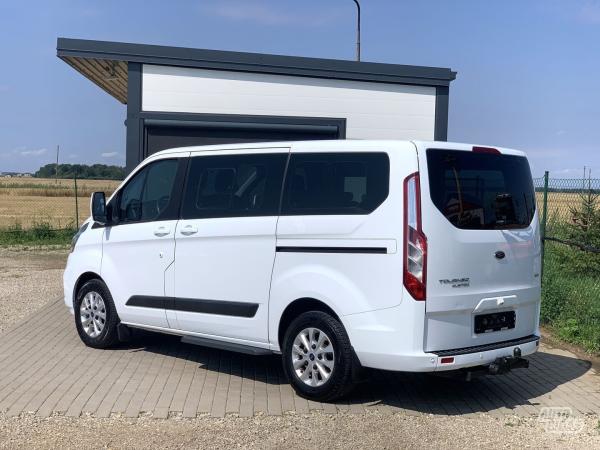 White Ford Transit Custom 2018 in Kaunas, with an engine capacity of 2.00 L and mileage of 192 thousand km for 17999 €, photo 4 on AUTOMOTO.COM.LV