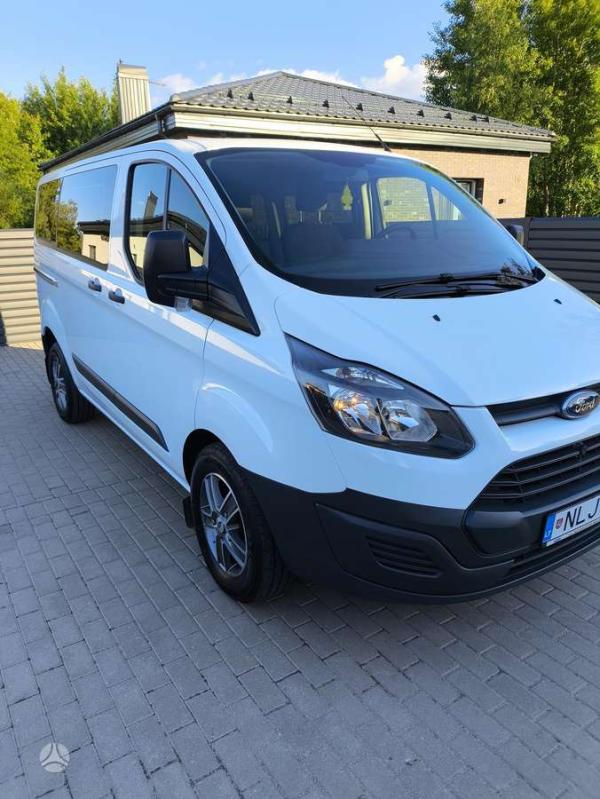 White Ford Transit Custom 2015 in Kaunas, with an engine capacity of 2.20 L and mileage of 216 thousand km for 9800 €, photo 3 on AUTOMOTO.COM.LV