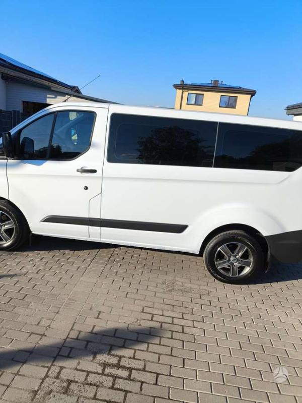 White Ford Transit Custom 2015 in Kaunas, with an engine capacity of 2.20 L and mileage of 216 thousand km for 9800 €, photo 9 on AUTOMOTO.COM.LV