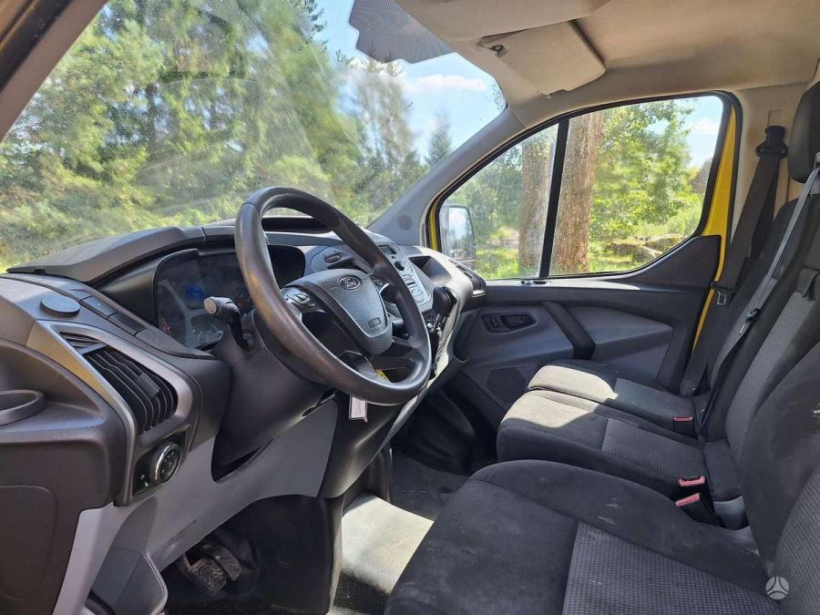 Yellow Ford Transit Custom 2015 in Taurage, with an engine capacity of 2.20 L and mileage of 230 thousand km for 3100 €, photo 9 on AUTOMOTO.COM.LV