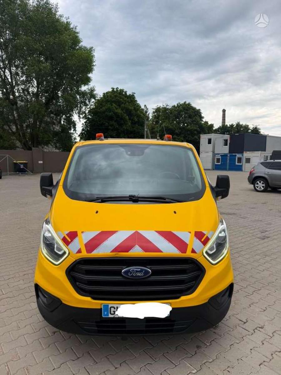Yellow Ford Transit Custom 2022 in Kaunas, with an engine capacity of 2.00 L and mileage of 262 thousand km for 8750 €, photo 5 on AUTOMOTO.COM.LV
