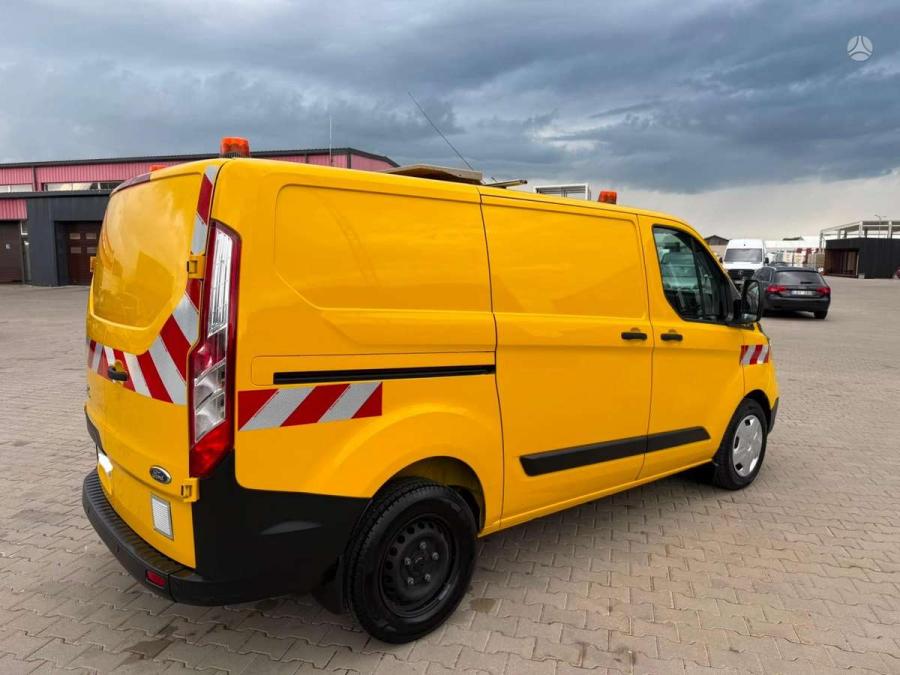 Yellow Ford Transit Custom 2022 in Kaunas, with an engine capacity of 2.00 L and mileage of 262 thousand km for 8750 €, photo 7 on AUTOMOTO.COM.LV