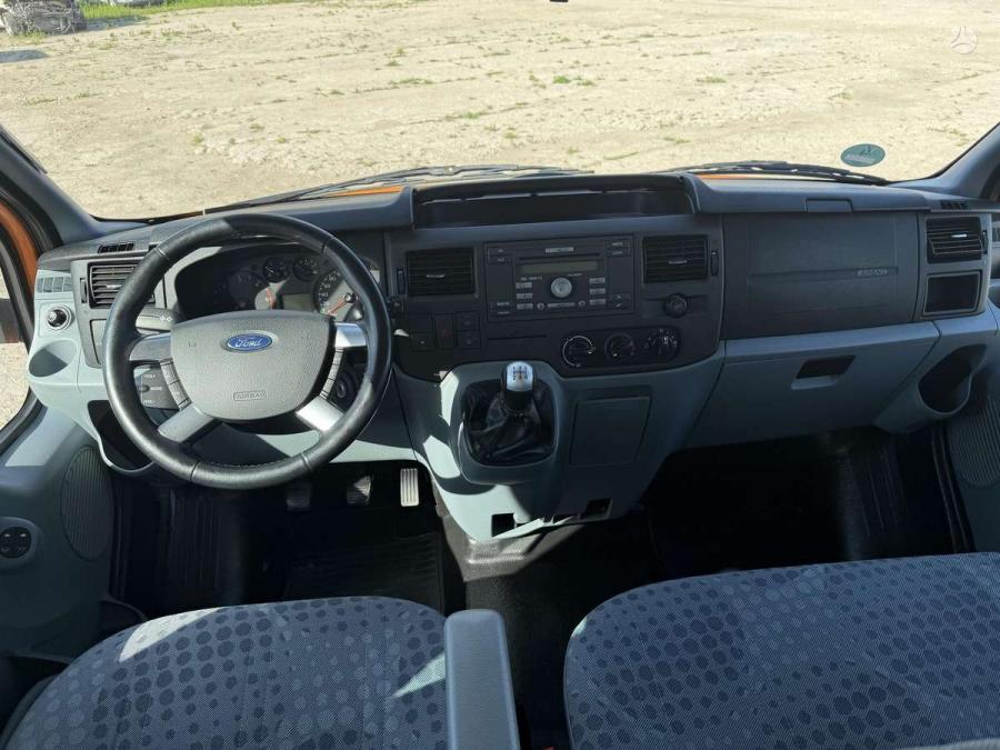 Orange Ford Transit 2012 in Kelme, with an engine capacity of 2.20 L and mileage of 182 thousand km for 7600 €, photo 12 on AUTOMOTO.COM.LV