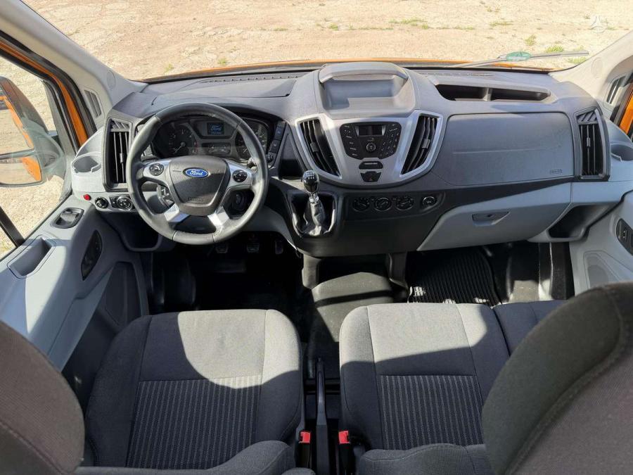 Orange Ford Transit 2016 in Kelme, with an engine capacity of 2.20 L and mileage of 216 thousand km for 12800 €, photo 12 on AUTOMOTO.COM.LV