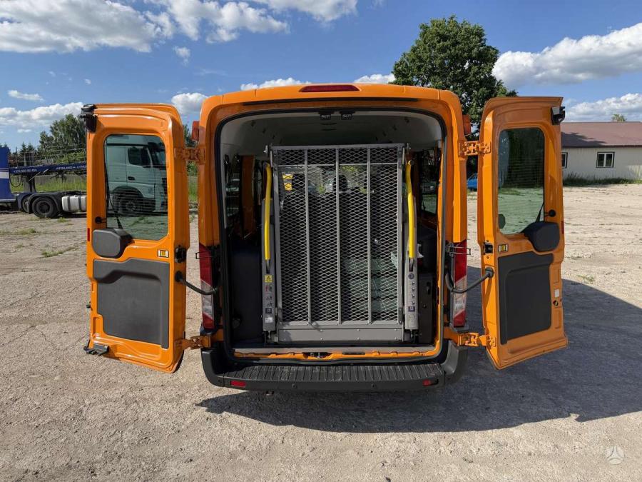 Orange Ford Transit 2016 in Kelme, with an engine capacity of 2.20 L and mileage of 216 thousand km for 12800 €, photo 16 on AUTOMOTO.COM.LV