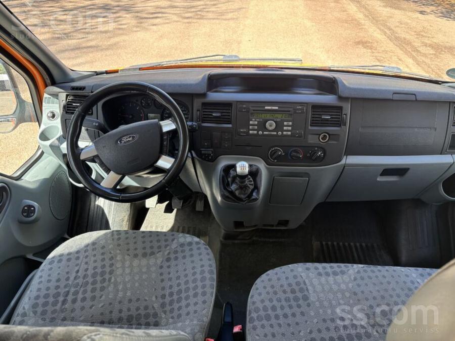 Orange Ford Transit 2011 in Ogre, with an engine capacity of 2.20 L and mileage of 93 thousand km for 7980 €, photo 13 on AUTOMOTO.COM.LV