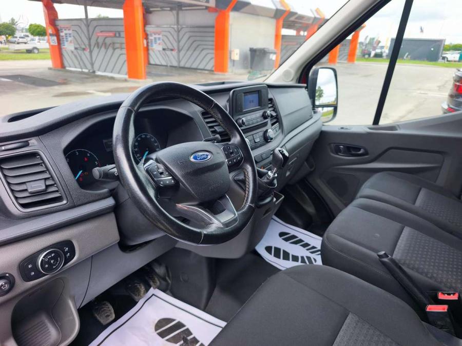 Red Ford Transit 2020 in Marijampole, with an engine capacity of 2.00 L and mileage of 125 thousand km for 15609 €, photo 14 on AUTOMOTO.COM.LV