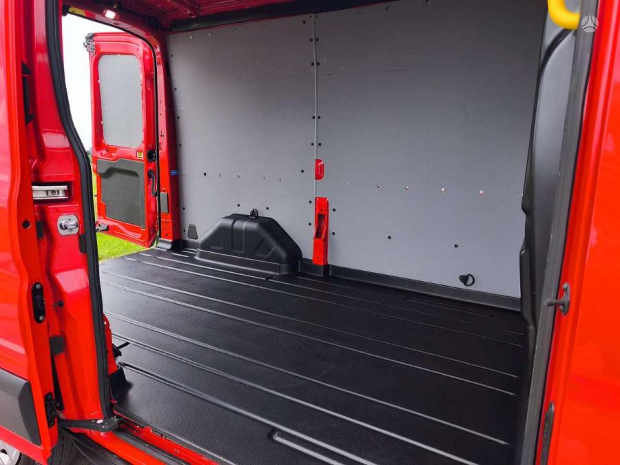 Red Ford Transit 2020 in Marijampole, with an engine capacity of 2.00 L and mileage of 125 thousand km for 15609 €, photo 19 on AUTOMOTO.COM.LV
