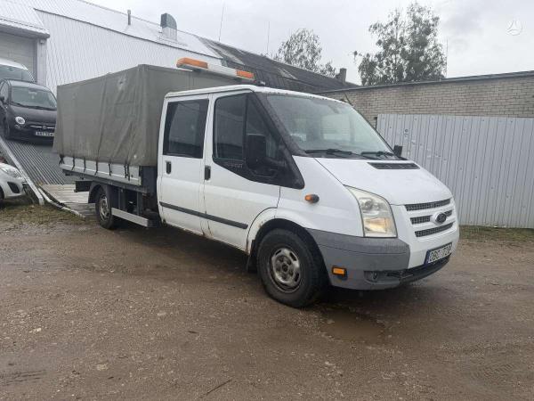 White Ford Transit 2014 in Kaunas, with an engine capacity of 2.20 L and mileage of 261 thousand km for 2900 €, photo 3 on AUTOMOTO.COM.LV