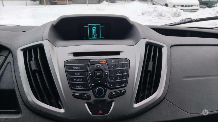 White Ford Transit 2015 in Klaipeda, with an engine capacity of 2.20 L and mileage of 218 thousand km for 11950 €, photo 31 on AUTOMOTO.COM.LV