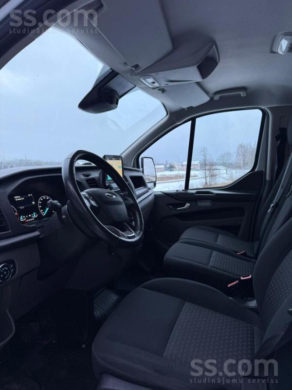 White Ford Transit 2018 in Riga, with an engine capacity of 2.00 L and mileage of 278 thousand km for 10970 €, photo 6 on AUTOMOTO.COM.LV