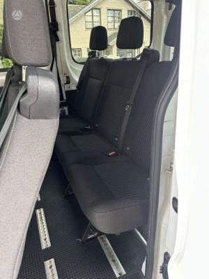 White Ford Transit 2018 in Taurage, with an engine capacity of 2.00 L and mileage of 232 thousand km for 13500 €, photo 18 on AUTOMOTO.COM.LV