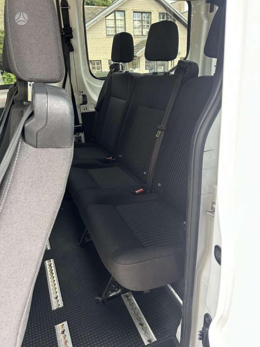 White Ford Transit 2018 in Taurage, with an engine capacity of 2.00 L and mileage of 232 thousand km for 13500 €, photo 18 on AUTOMOTO.COM.LV