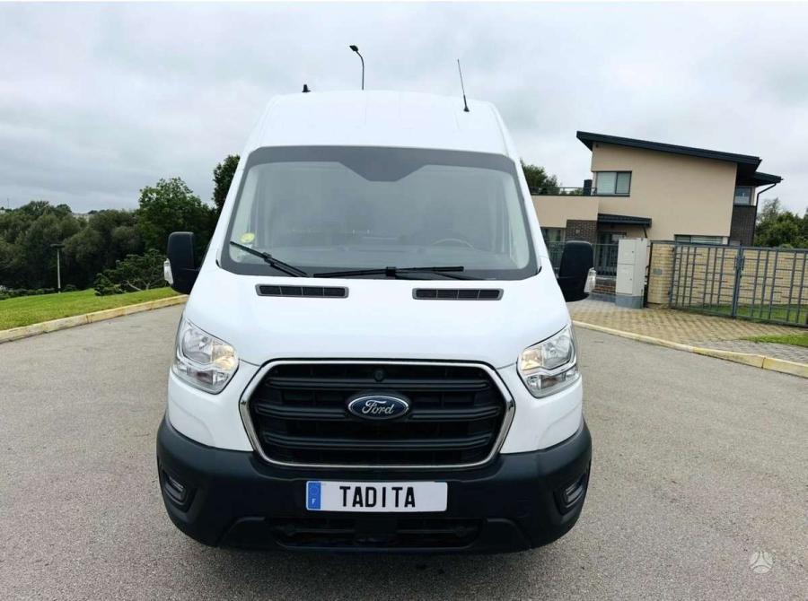 White Ford Transit 2020 in Taurage, with an engine capacity of 2.00 L and mileage of 90 thousand km for 16900 €, photo 4 on AUTOMOTO.COM.LV