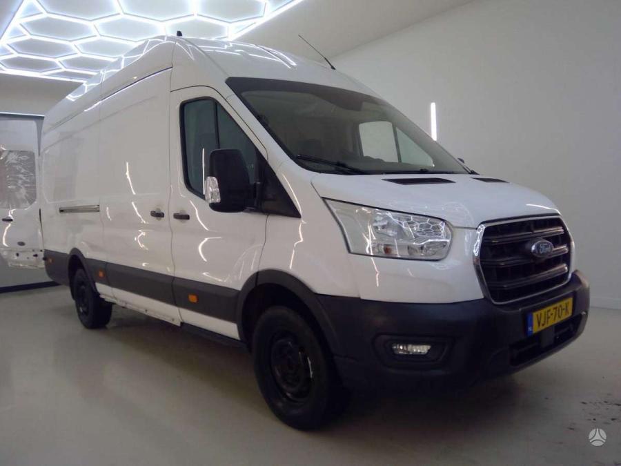 White Ford Transit 2021 in Vilnius, with an engine capacity of 2.00 L and mileage of 82 thousand km for 16490 €, photo 2 on AUTOMOTO.COM.LV