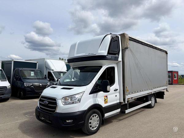 White Ford Transit 2022 in Vilnius, with an engine capacity of 2.00 L and mileage of 265 thousand km for 19900 €, photo 2 on AUTOMOTO.COM.LV