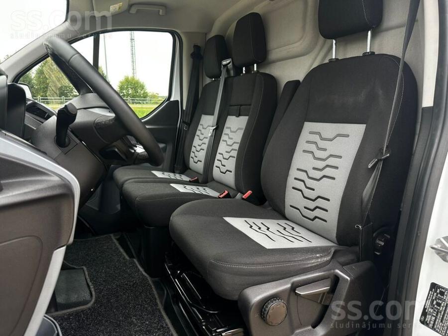 White Ford Transit 2015 in Jelgava, with an engine capacity of 2.20 L and mileage of 0 thousand km for 8990 €, photo 9 on AUTOMOTO.COM.LV