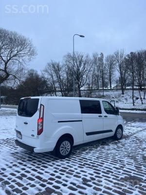 White Ford Transit 2018 in Riga, with an engine capacity of 2.00 L and mileage of 229 thousand km for 12800 €, photo 5 on AUTOMOTO.COM.LV