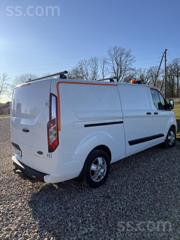 White Ford Transit 2018 in Dobele, with an engine capacity of 2.00 L and mileage of 256 thousand km for 9950 €, photo 3 on AUTOMOTO.COM.LV