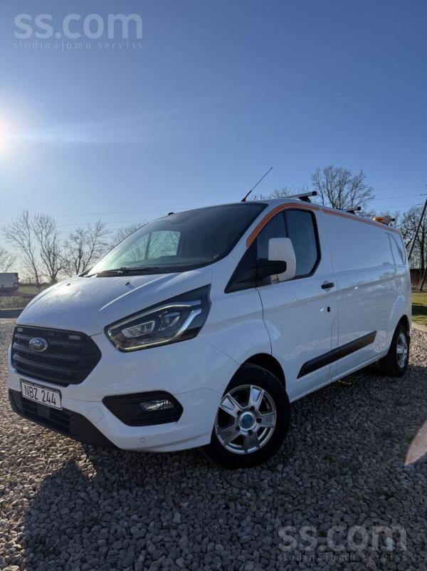 White Ford Transit 2018 in Dobele, with an engine capacity of 2.00 L and mileage of 256 thousand km for 9950 €, photo 7 on AUTOMOTO.COM.LV