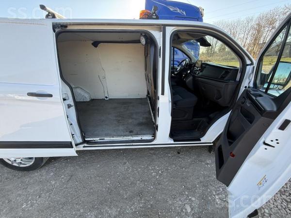 White Ford Transit 2018 in Dobele, with an engine capacity of 2.00 L and mileage of 256 thousand km for 9950 €, photo 9 on AUTOMOTO.COM.LV