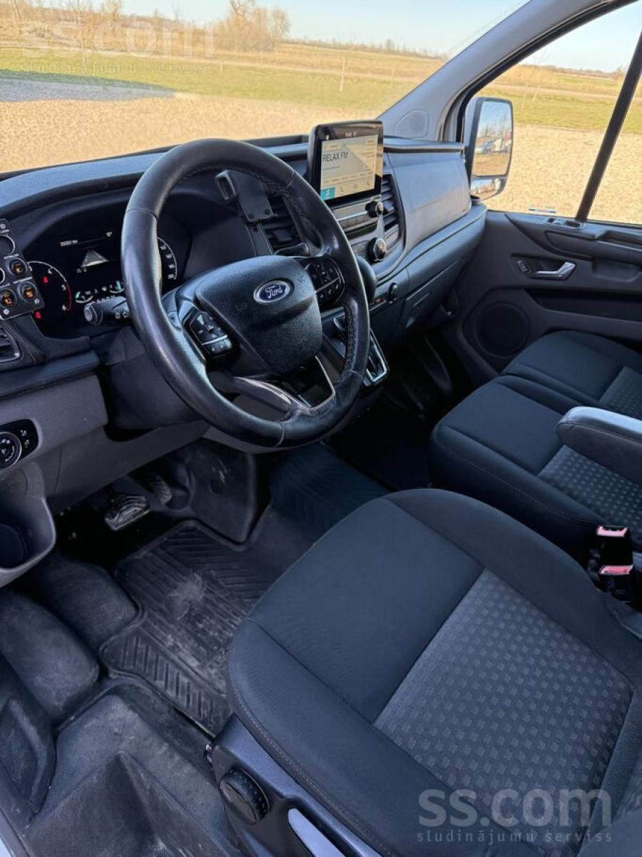 White Ford Transit 2018 in Dobele, with an engine capacity of 2.00 L and mileage of 256 thousand km for 9950 €, photo 12 on AUTOMOTO.COM.LV