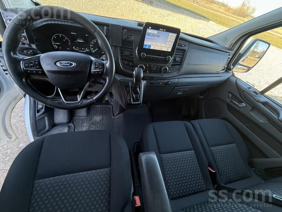 White Ford Transit 2018 in Dobele, with an engine capacity of 2.00 L and mileage of 256 thousand km for 9950 €, photo 13 on AUTOMOTO.COM.LV