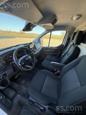 White Ford Transit 2018 in Dobele, with an engine capacity of 2.00 L and mileage of 256 thousand km for 9950 €, photo 14 on AUTOMOTO.COM.LV