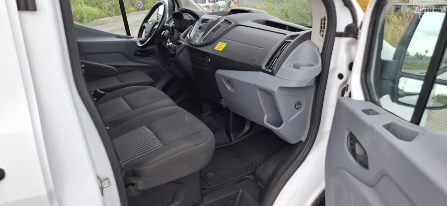 White Ford Transit 2019 in Marijampole, with an engine capacity of 2.00 L and mileage of 235 thousand km for 13100 €, photo 13 on AUTOMOTO.COM.LV