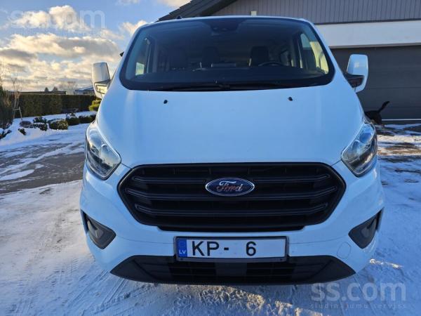 White Ford Transit 2020 in Riga, with an engine capacity of 2.00 L and mileage of 211 thousand km for 19350 €, photo 3 on AUTOMOTO.COM.LV