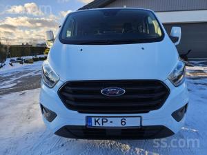 White Ford Transit 2020 in Riga, with an engine capacity of 2.00 L and mileage of 211 thousand km for 19350 €, photo 4 on AUTOMOTO.COM.LV