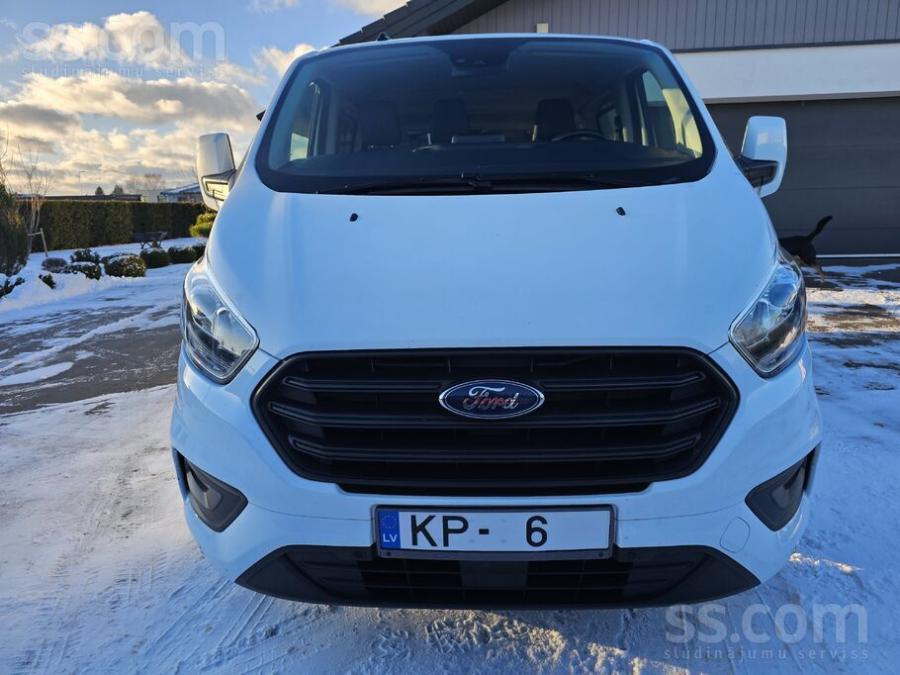 White Ford Transit 2020 in Riga, with an engine capacity of 2.00 L and mileage of 211 thousand km for 19350 €, photo 4 on AUTOMOTO.COM.LV