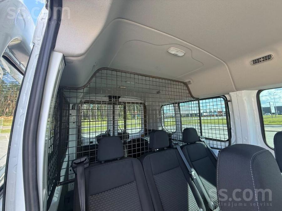 White Ford Transit 2021 in Riga, with an engine capacity of 2.00 L and mileage of 163 thousand km for 23000 €, photo 14 on AUTOMOTO.COM.LV