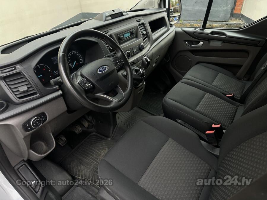 White Ford Transit 2023 in Riga, with an engine capacity of 2.00 L and mileage of 91 thousand km for 20450 €, photo 8 on AUTOMOTO.COM.LV