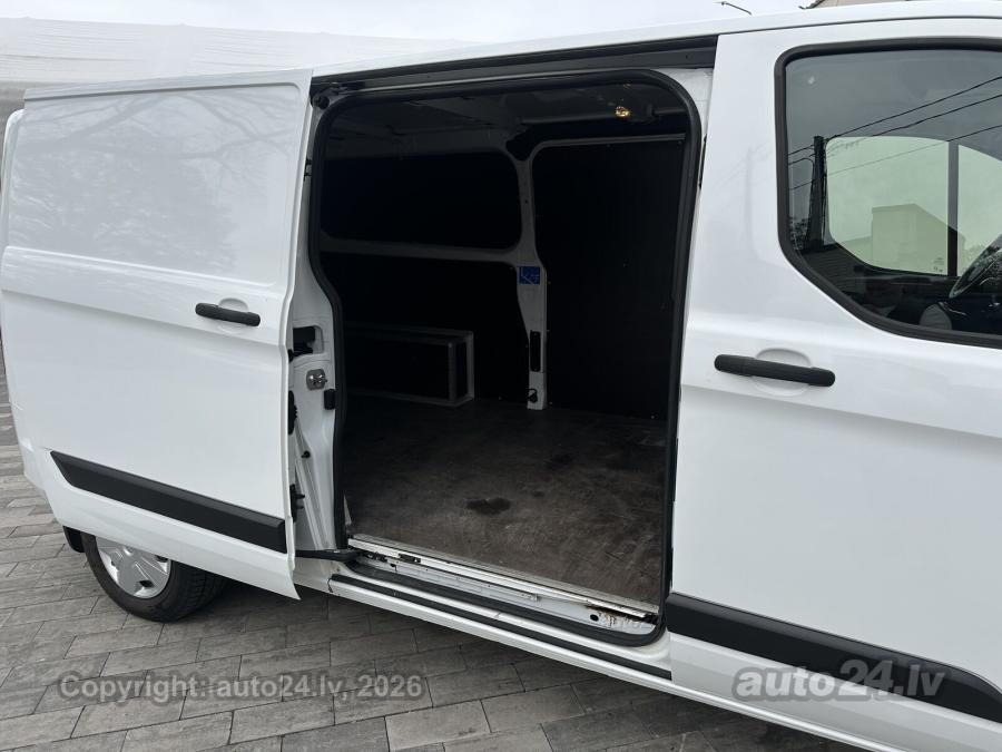White Ford Transit 2023 in Riga, with an engine capacity of 2.00 L and mileage of 91 thousand km for 20450 €, photo 16 on AUTOMOTO.COM.LV