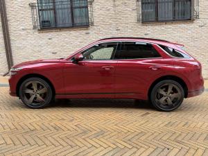 Red Genesis GV70 2023 in Vilnius, with an engine capacity of 3.50 L and mileage of 50 thousand km for 34400 €, photo 4 on AUTOMOTO.COM.LV